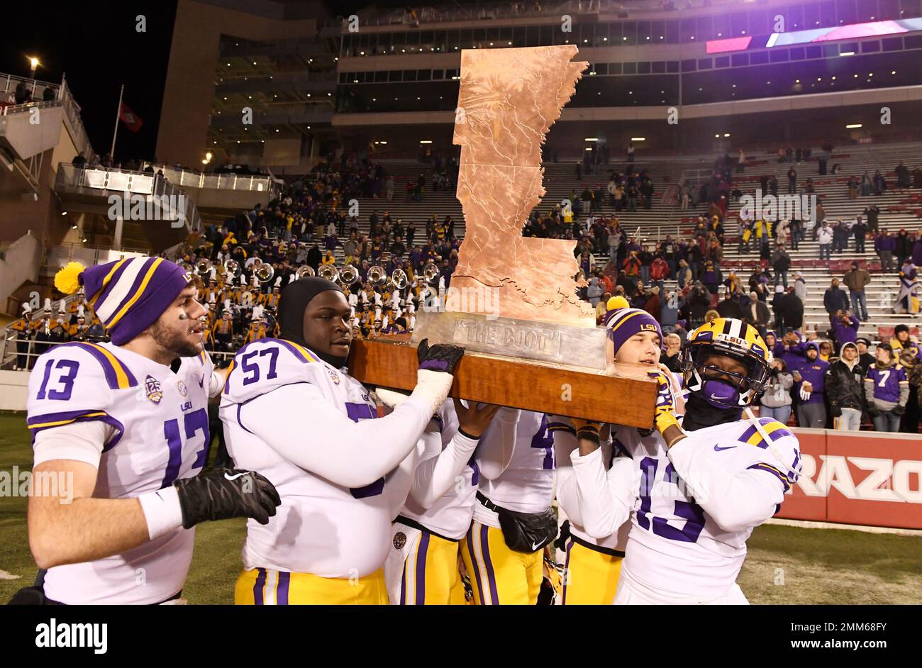 LSU players Andre Sale (13), Chasen Hines (57) and Jontre Kirklin ...