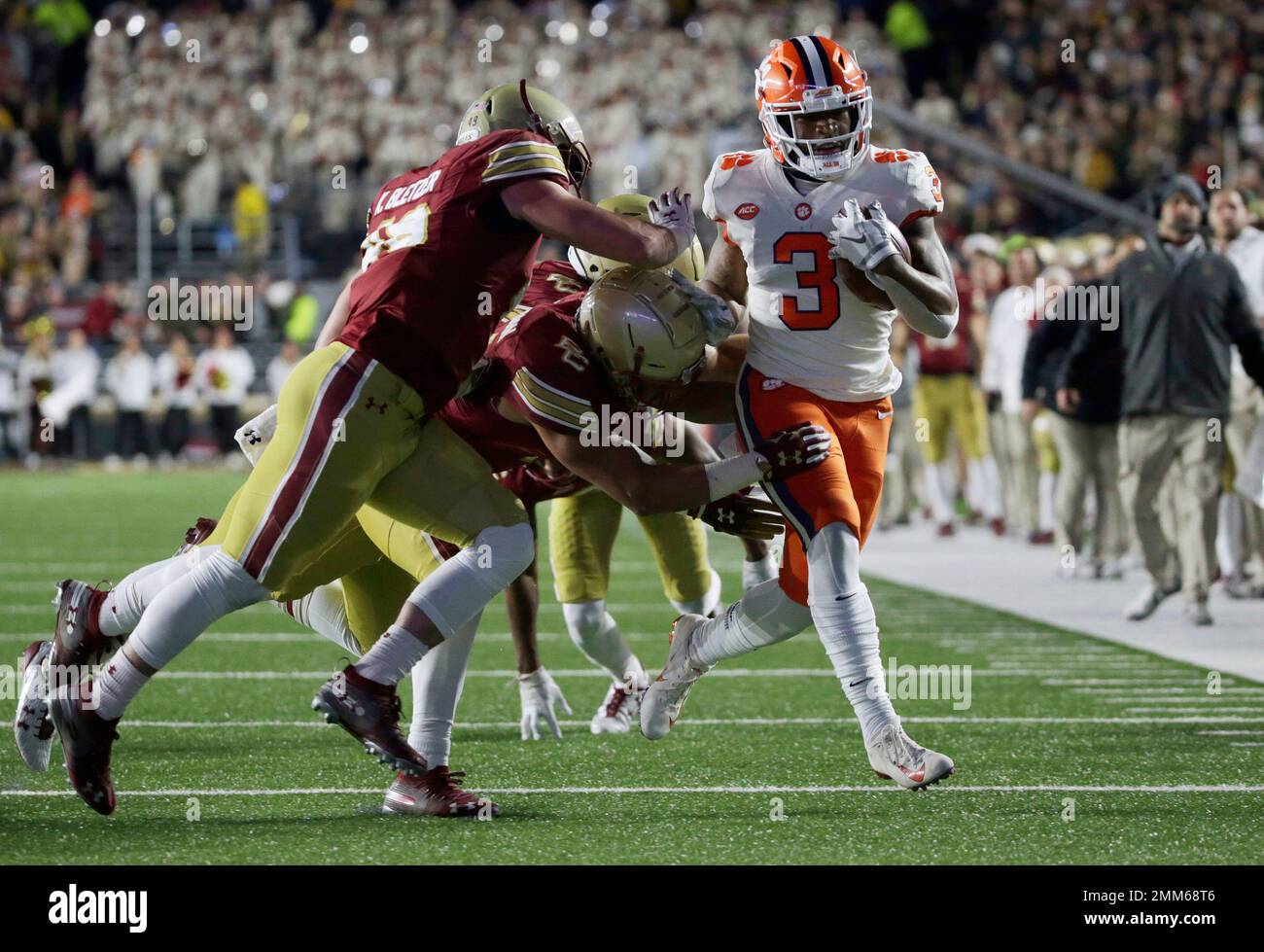 Boston College defenders chase Clemson wide receiver Amari Rodgers (3 ...