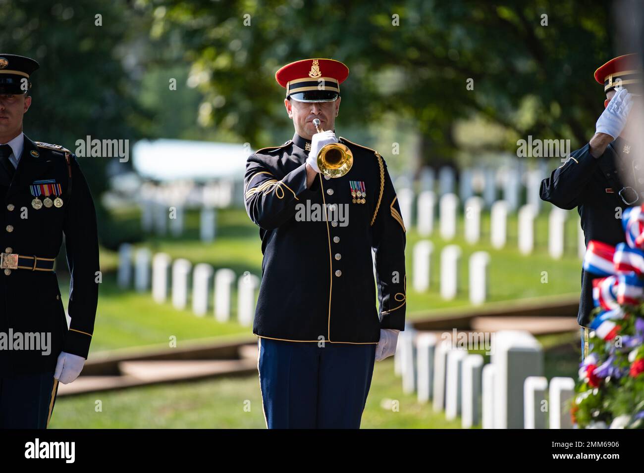 A bugler from the U.S. Army Band, "Pershing's Own", plays "Taps" during ...
