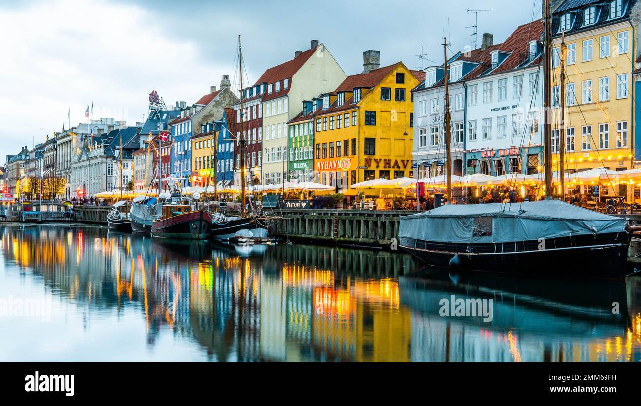 houses and boats of nyhavn street in copenhagen Stock Photo - Alamy