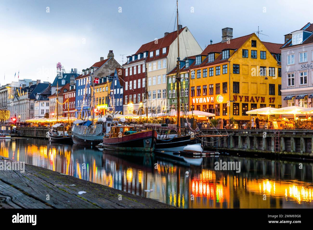 houses and boats of nyhavn street in copenhagen Stock Photo - Alamy