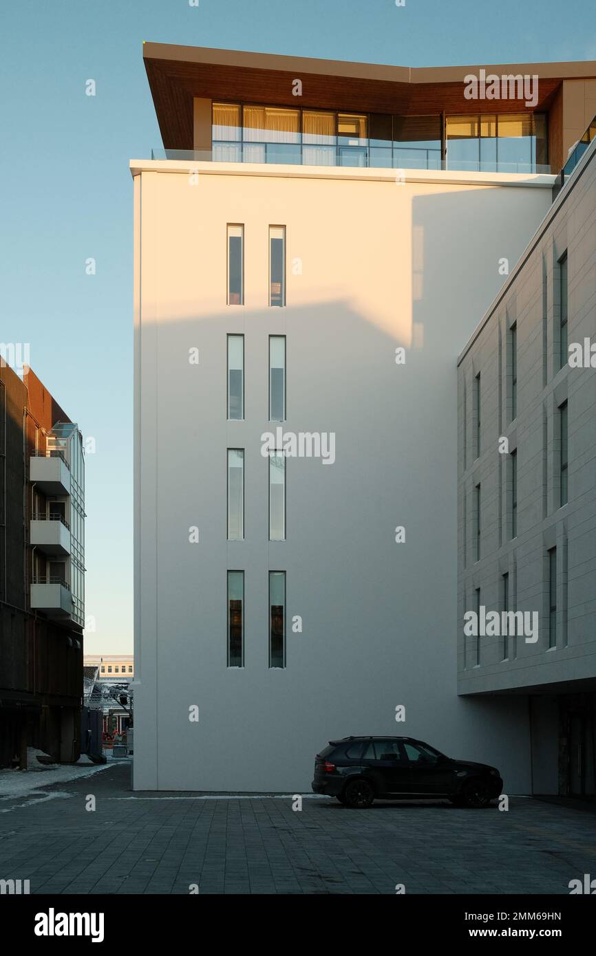 Car parked near modern building Stock Photo - Alamy