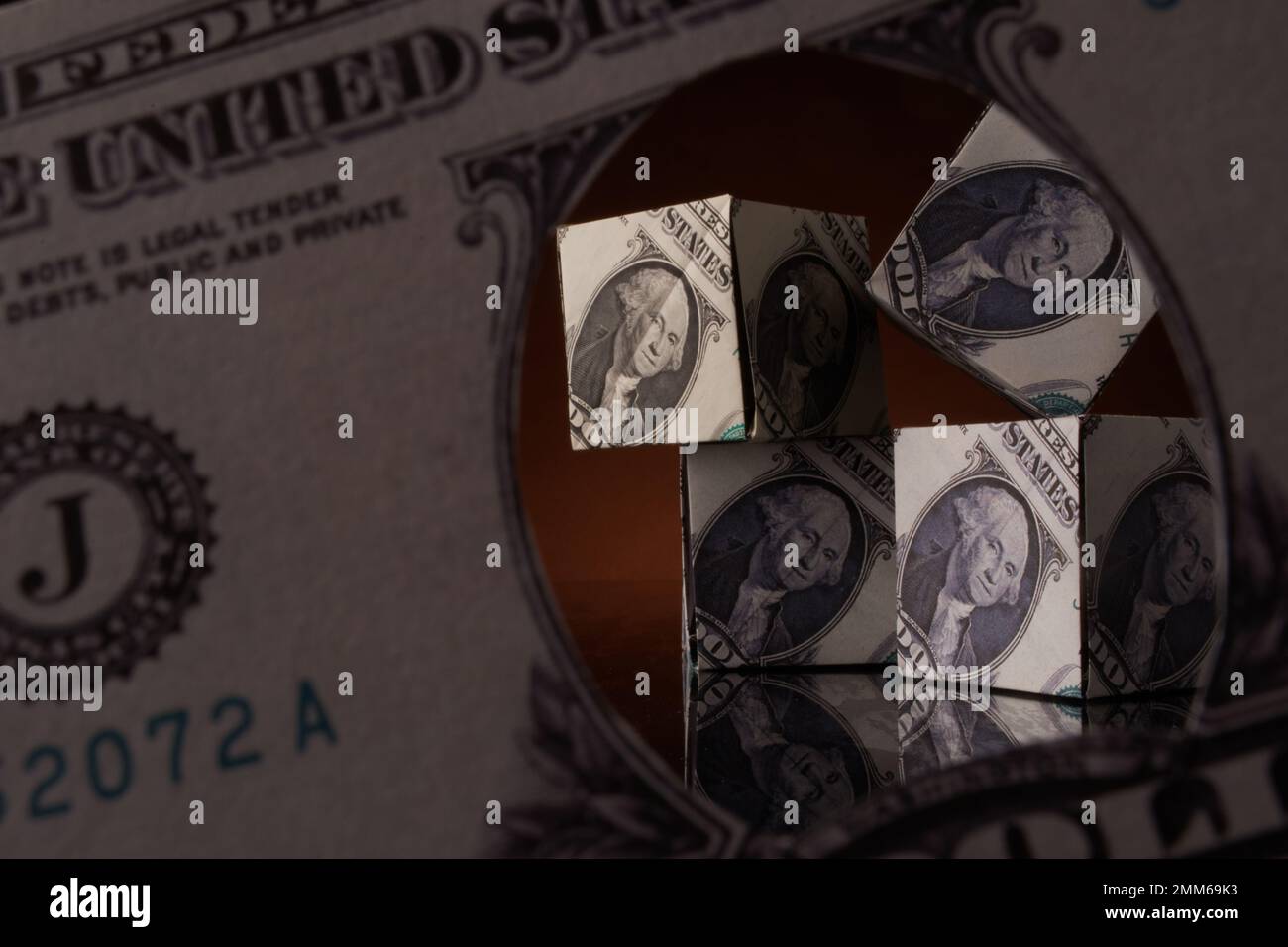 Origami dollar cubes made from dollar bills Stock Photo - Alamy