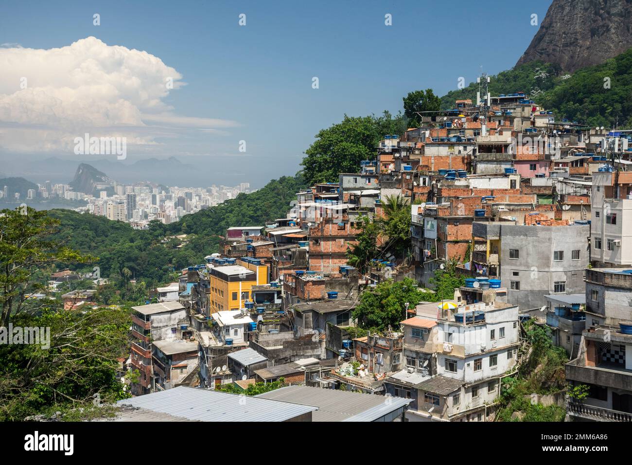 Beautiful view to poor favela houses on hill side Stock Photo - Alamy