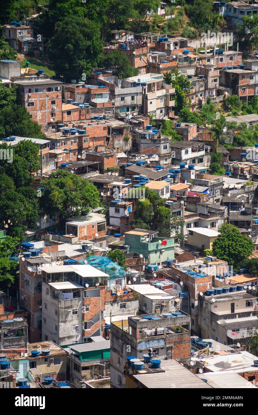 Beautiful view to poor favela houses on hill side Stock Photo - Alamy
