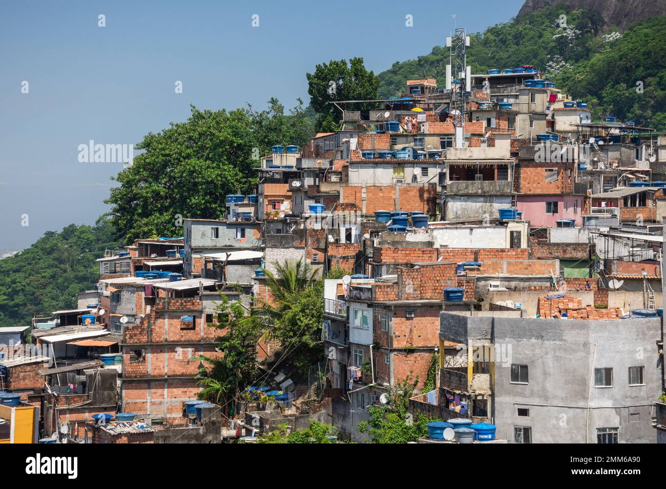 Beautiful view to poor favela houses on hill side Stock Photo - Alamy