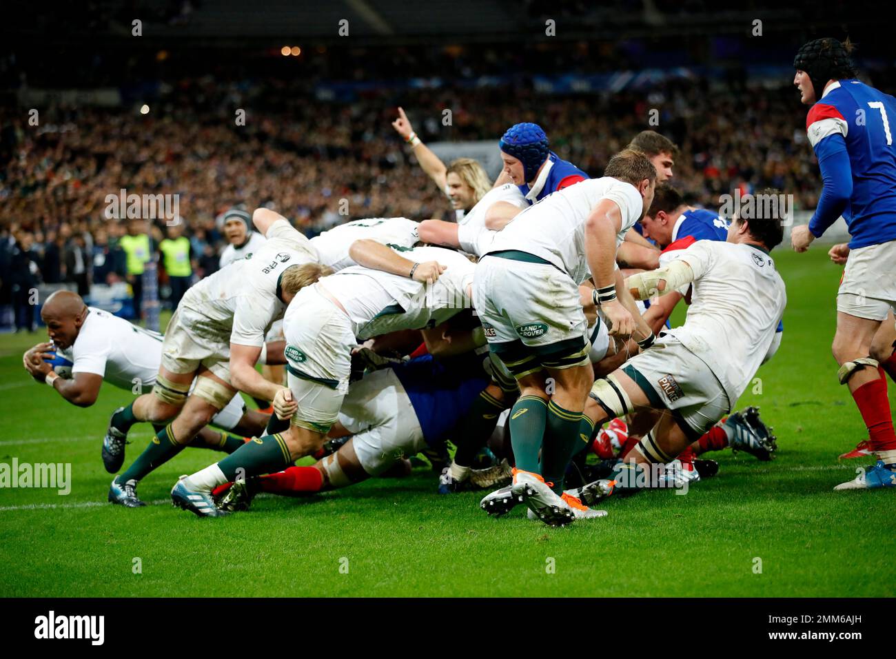 South Africa's Bongi Mbonambi, left, breaks from rolling maul to score ...