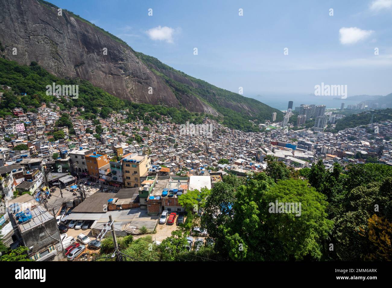 Beautiful view to poor favela houses on hill side Stock Photo - Alamy