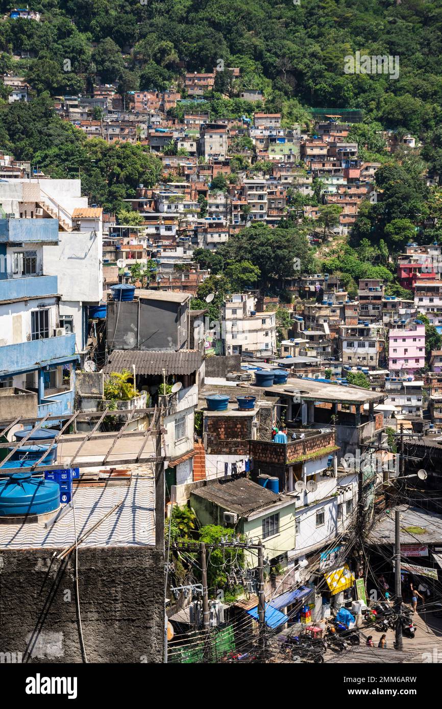 Beautiful view to poor favela houses on hill side Stock Photo - Alamy