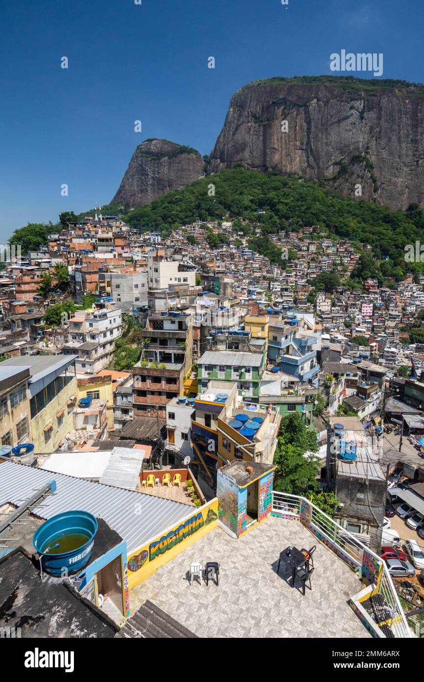Beautiful view to poor favela houses on hill side Stock Photo - Alamy