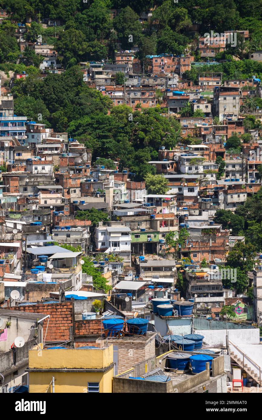 Beautiful view to poor favela houses on hill side Stock Photo - Alamy