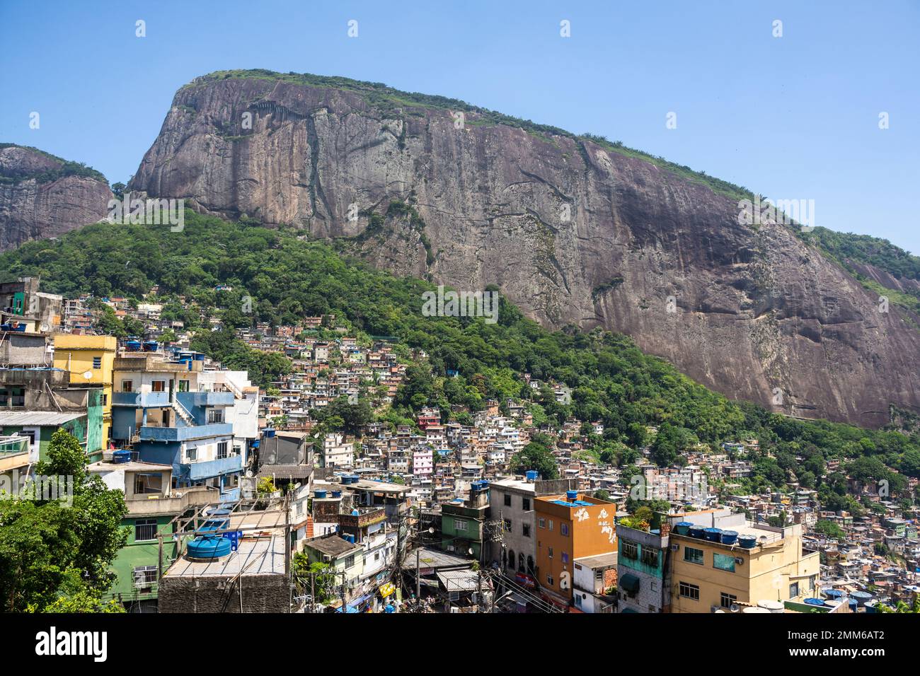 Beautiful view to poor favela houses on hill side Stock Photo - Alamy