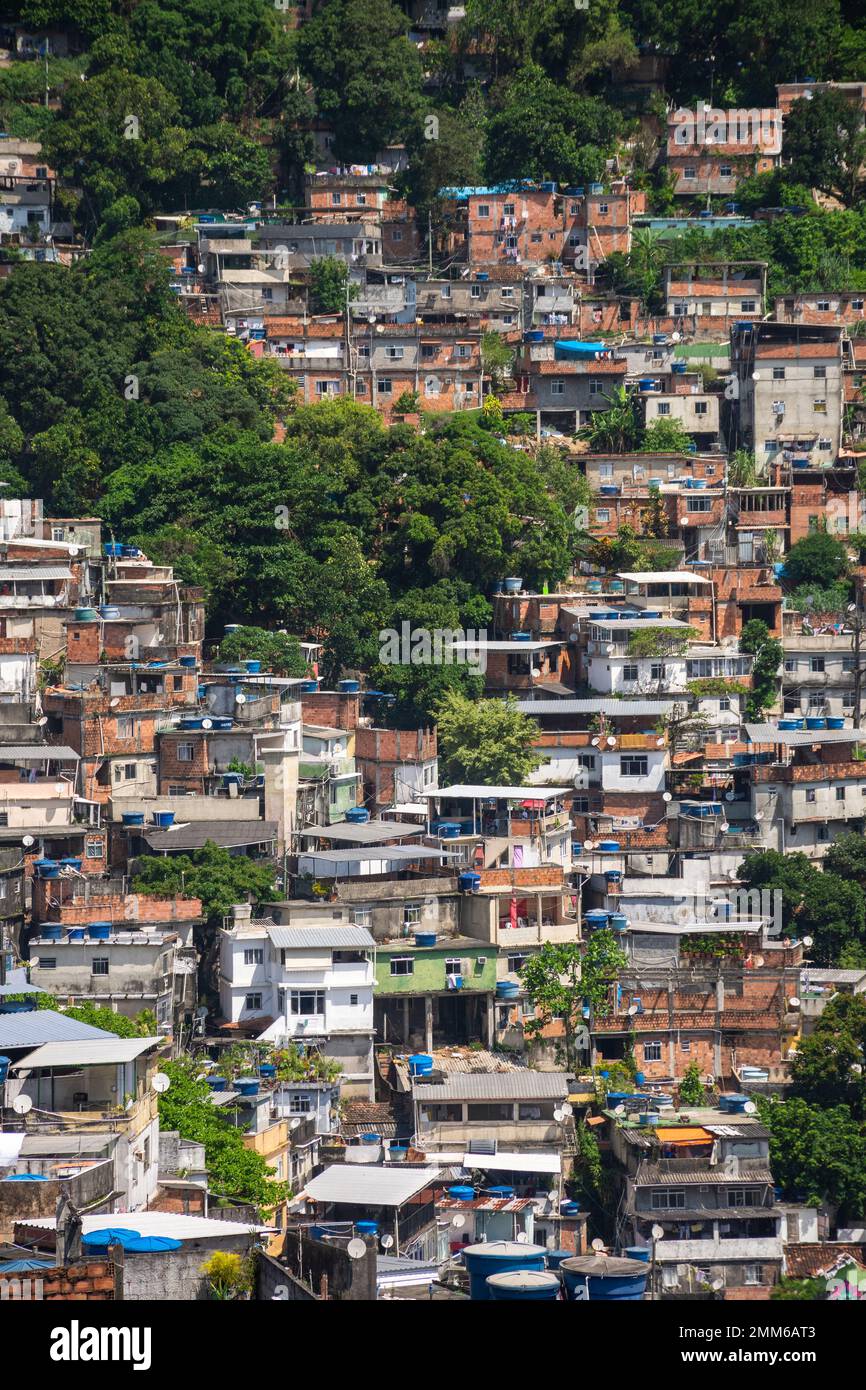 Beautiful view to poor favela houses on hill side Stock Photo - Alamy