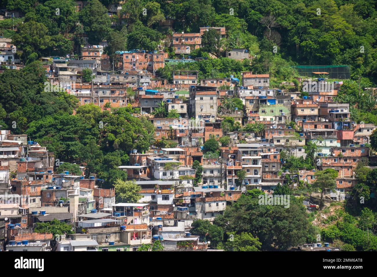 Beautiful view to poor favela houses on hill side Stock Photo - Alamy