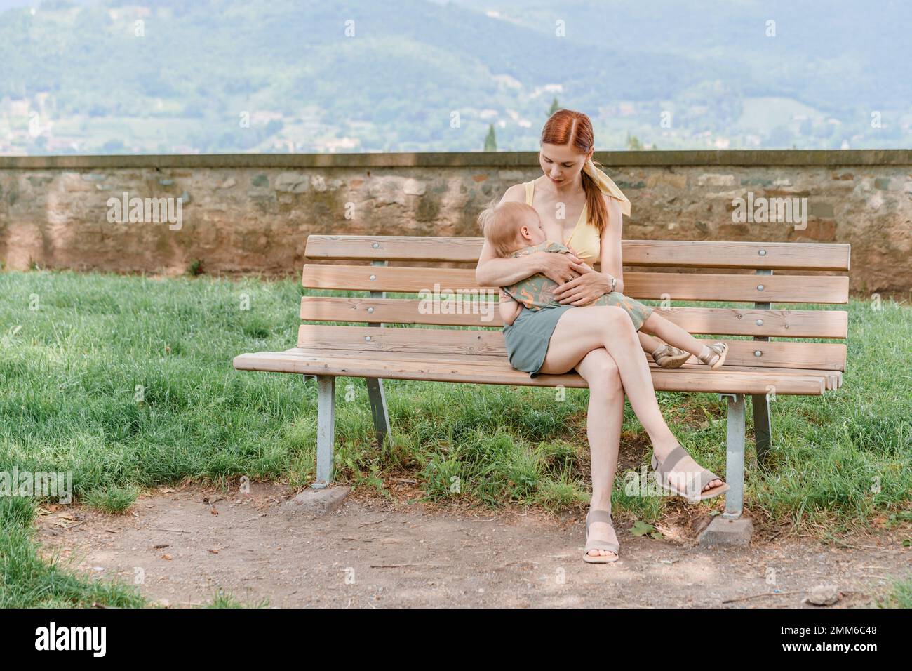 Woman breastfeeding hi-res stock photography and images - Alamy