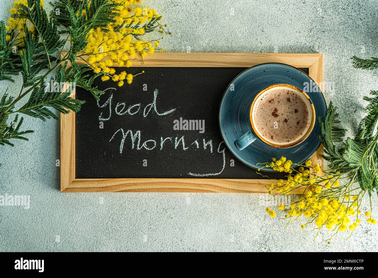 Coffee and mimosa flowers with Good Morning on chalkboard Stock Photo ...
