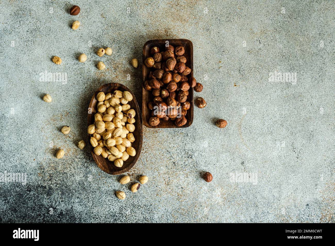 Organic food concept with bowl full of nuts Stock Photo - Alamy