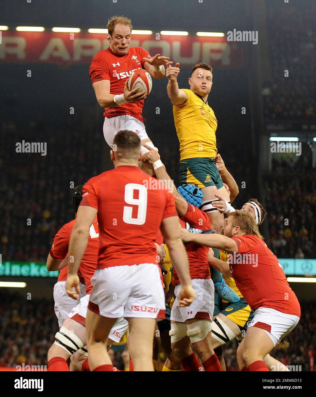 Wales Alun Wyn Jones, left, takes lineout ball from Australia's Izack ...