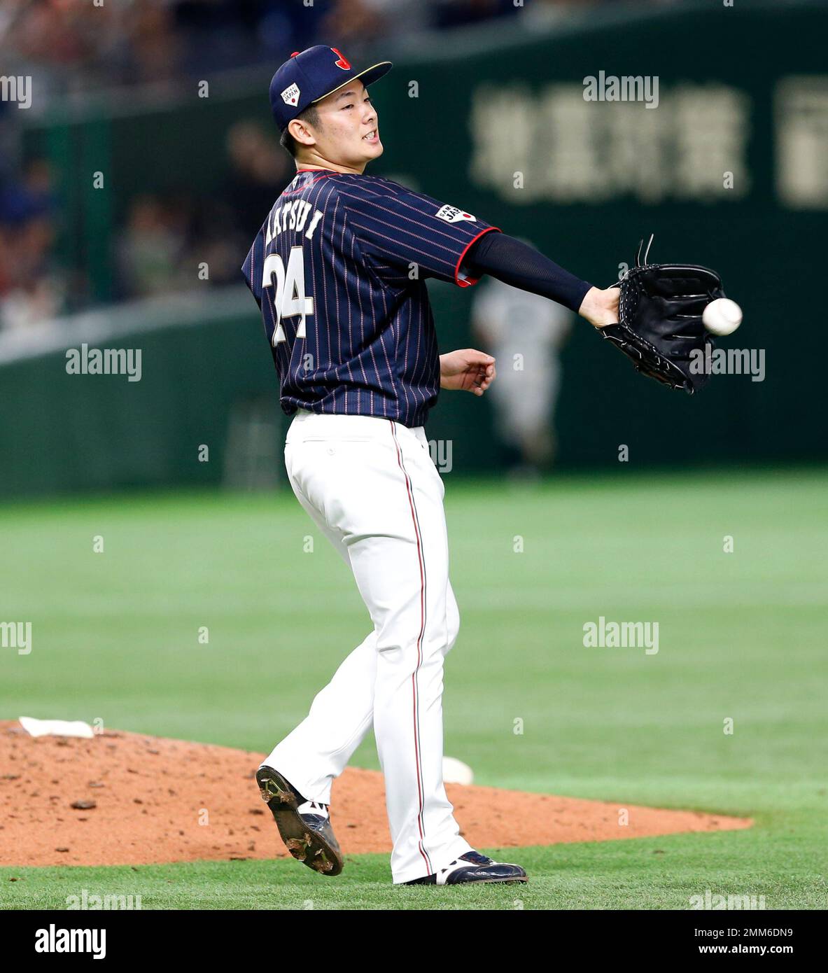 All Japan's closer Yuki Matsui catches the winning ball after beating ...