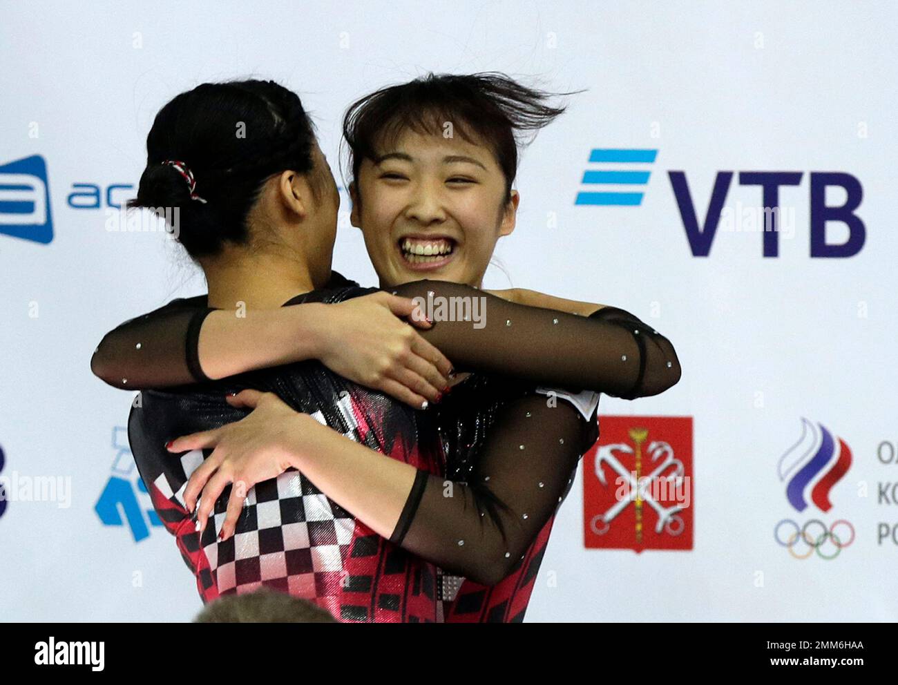 Hikaru Mori and Megu Uyama of Japan celebrate their victory in the ...