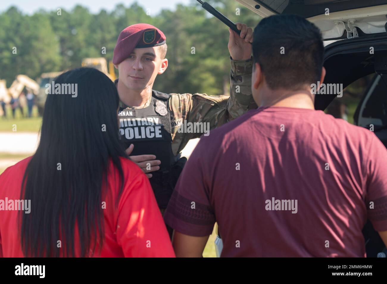 A military police Soldier with 16th MP Brigade speaks with school ...