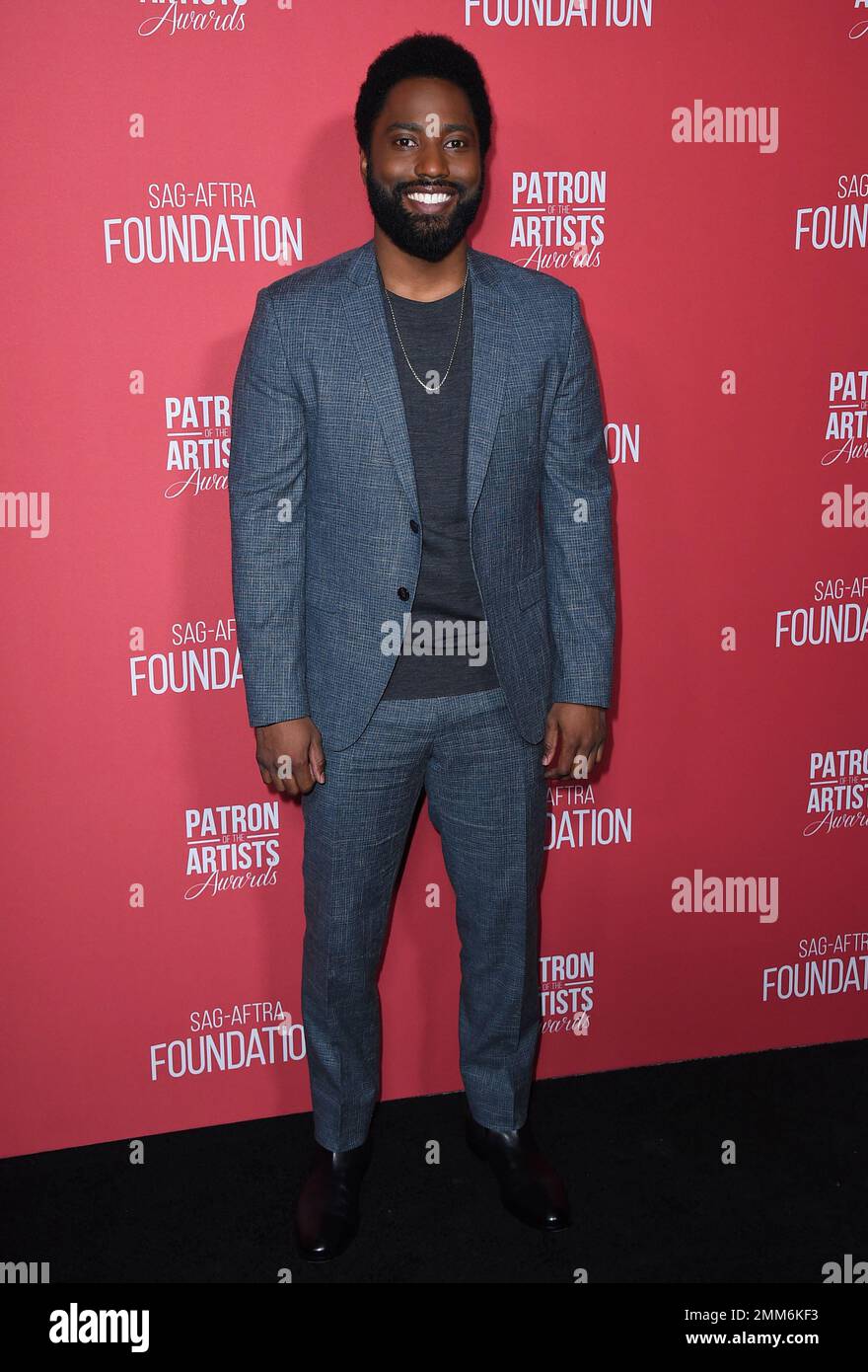 John David Washington arrives at the Patron of the Artists Awards on ...