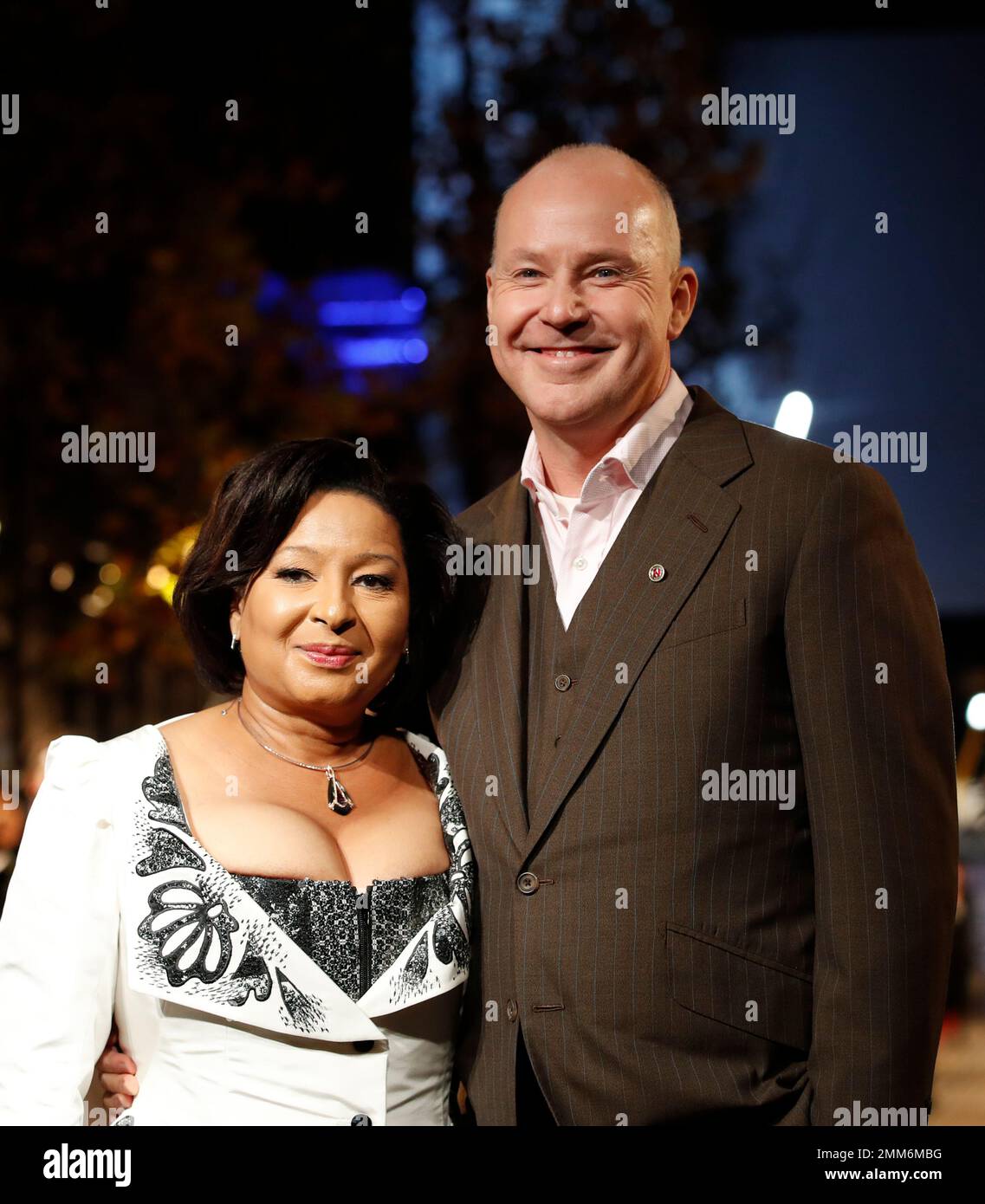Director David Yates and his wife Yvonne Walcott pose at the world ...