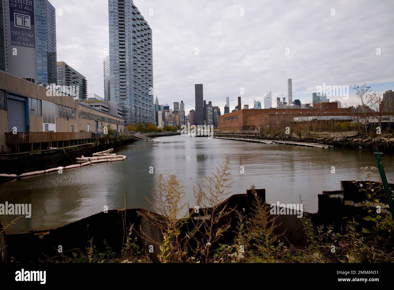 New residential apartment buildings, left, and an old warehouse, right ...