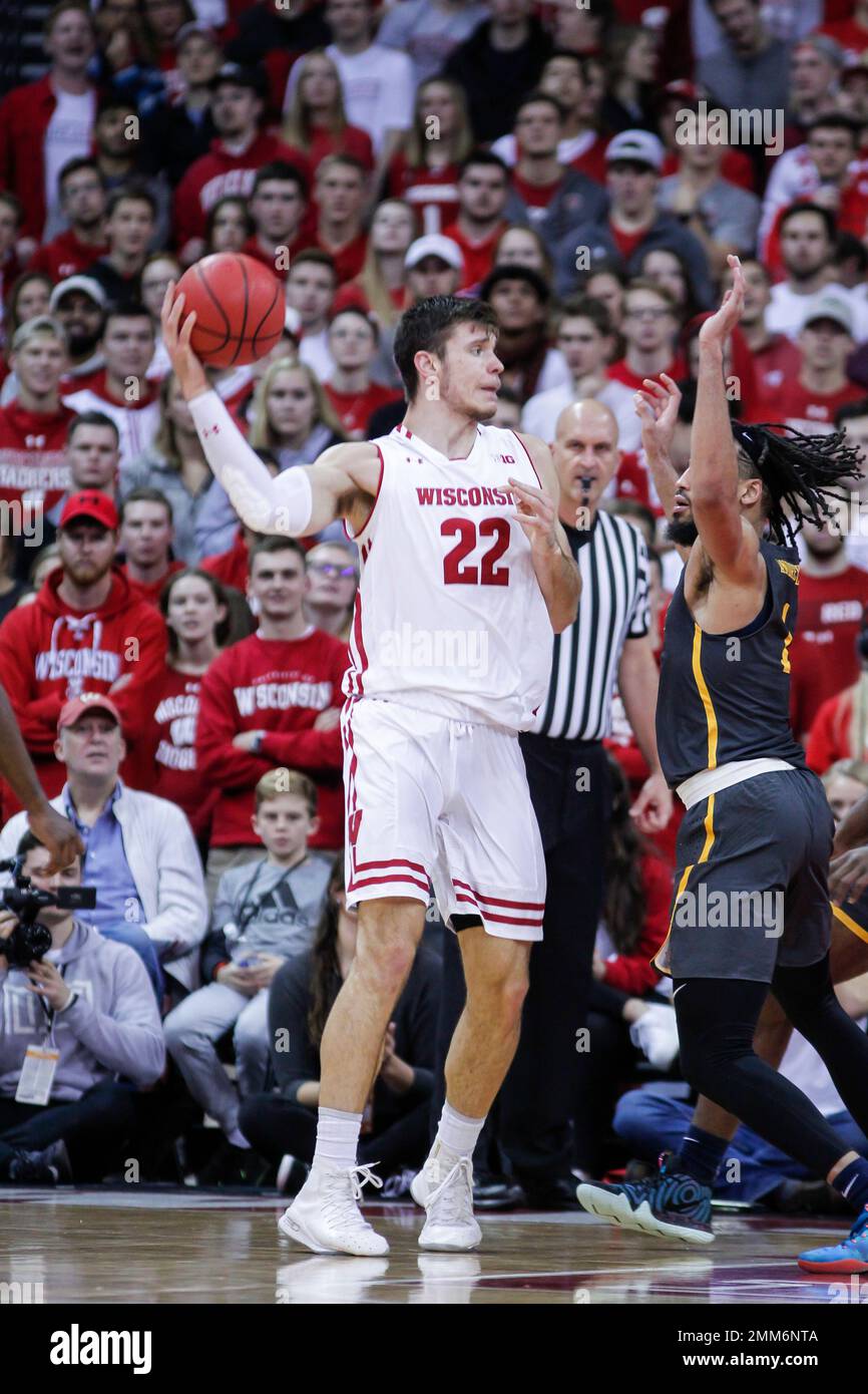 Wisconsin's Ethan Happ (22) and Coppin State's Chad Andrews-Fulton (1 ...