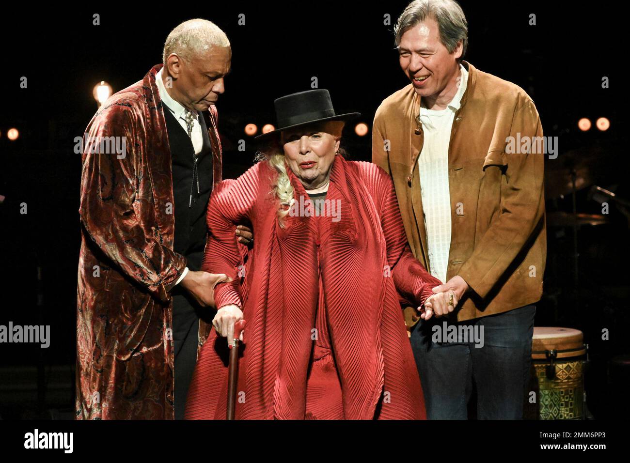 Joni Mitchell presented with a birthday cake on stage at JONI 75: A ...