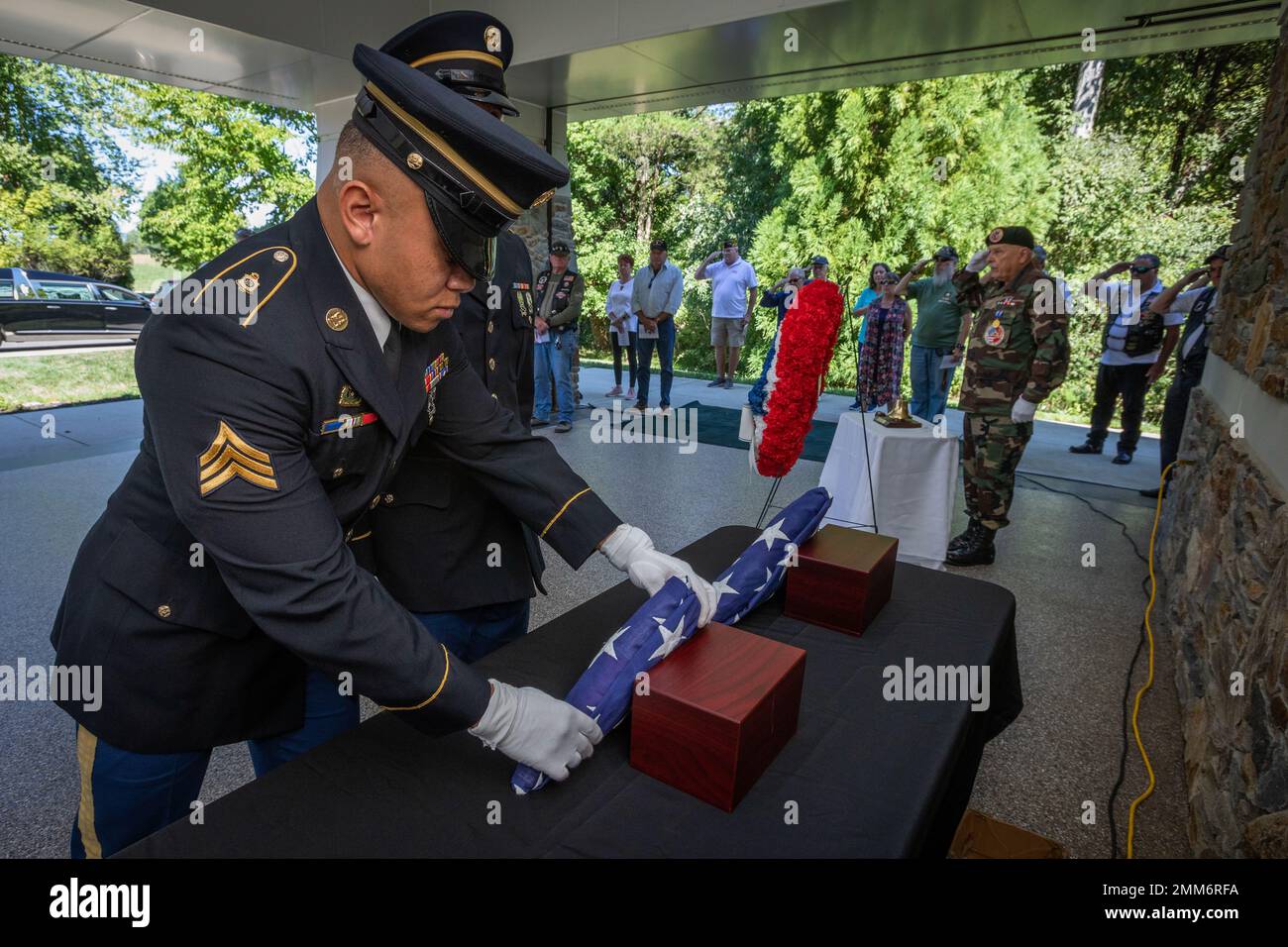 U.S. Army Sgt. Bless E. Sherrill, left, Headquarters and Headquarters ...
