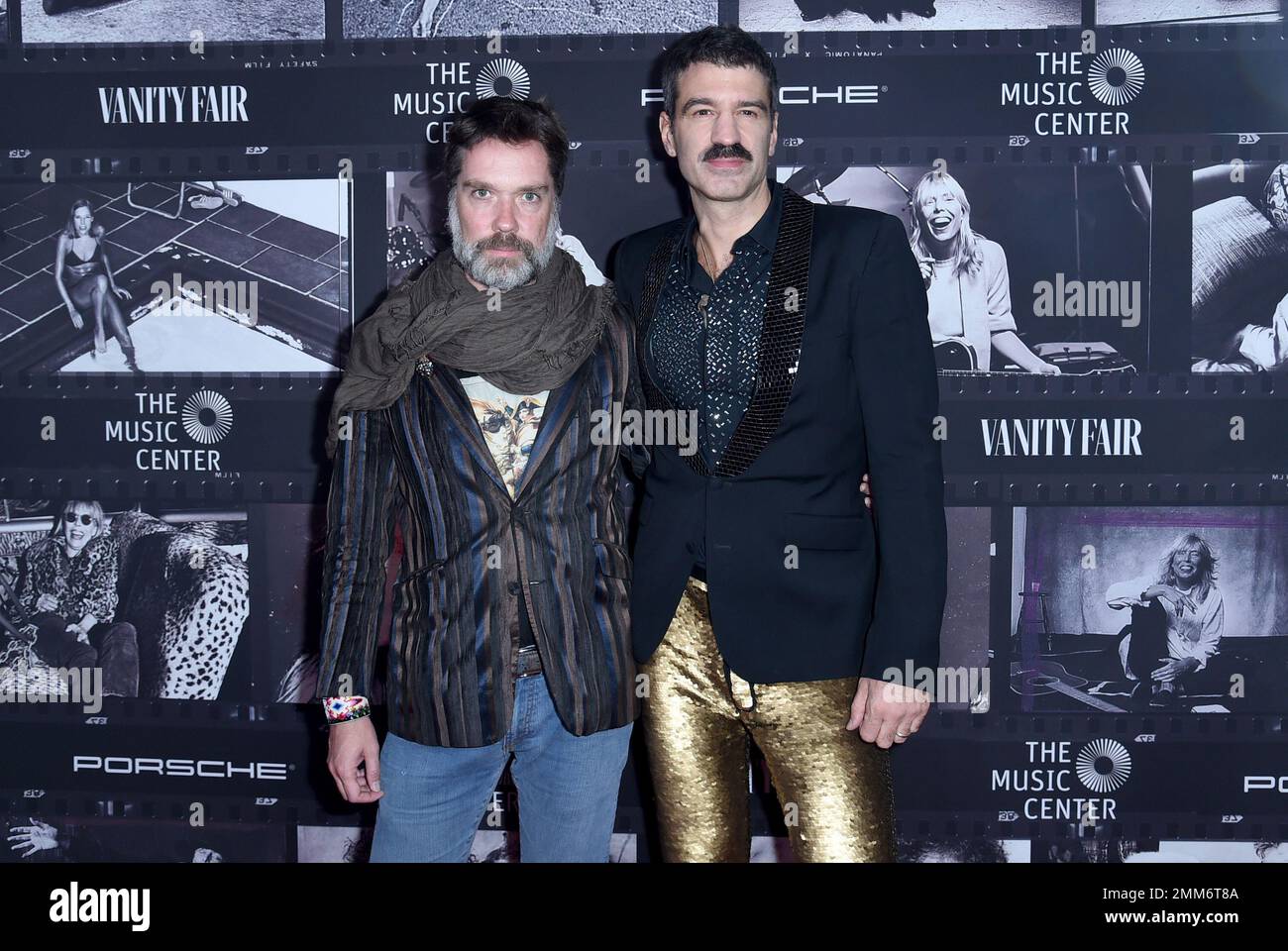 Rufus Wainwright, left, and Jorn Weisbrodt arrive at JONI 75: A ...