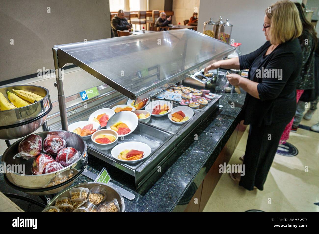 Free included breakfast self serve service buffet line hi-res stock ...