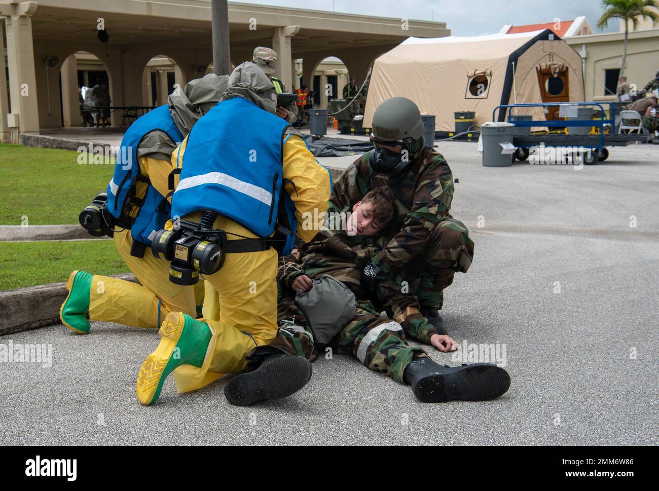 U.S. Air Force Airmen with the 36th Medical Group examine a patient ...