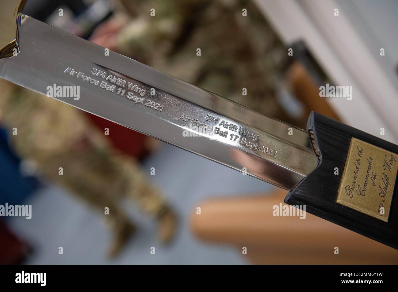 Engravings shine off of a newly presented sword that was handmade by ...