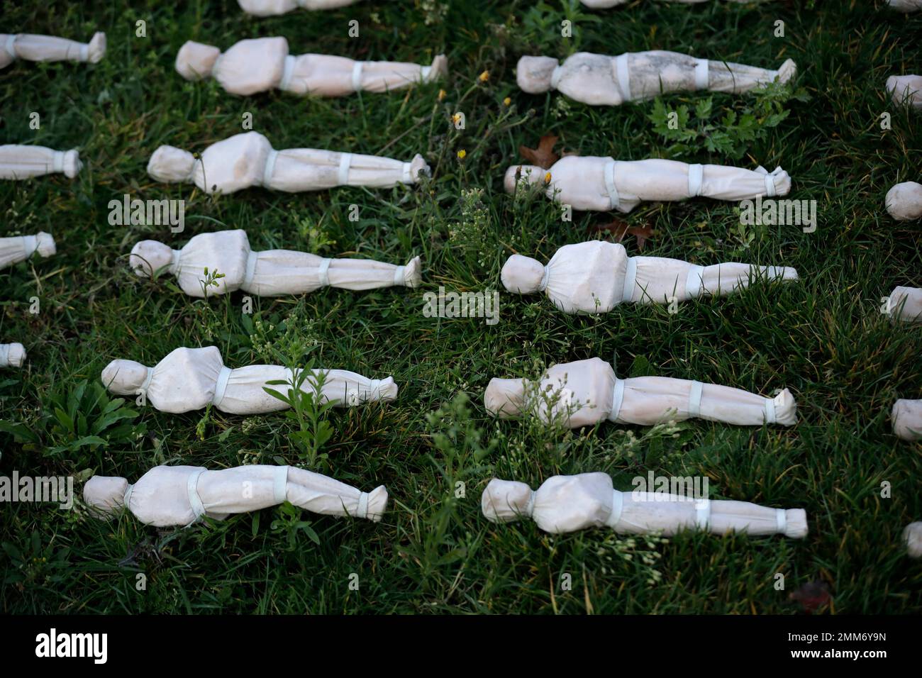 Shrouded figures forming part of British artist Rob Heard's piece of ...