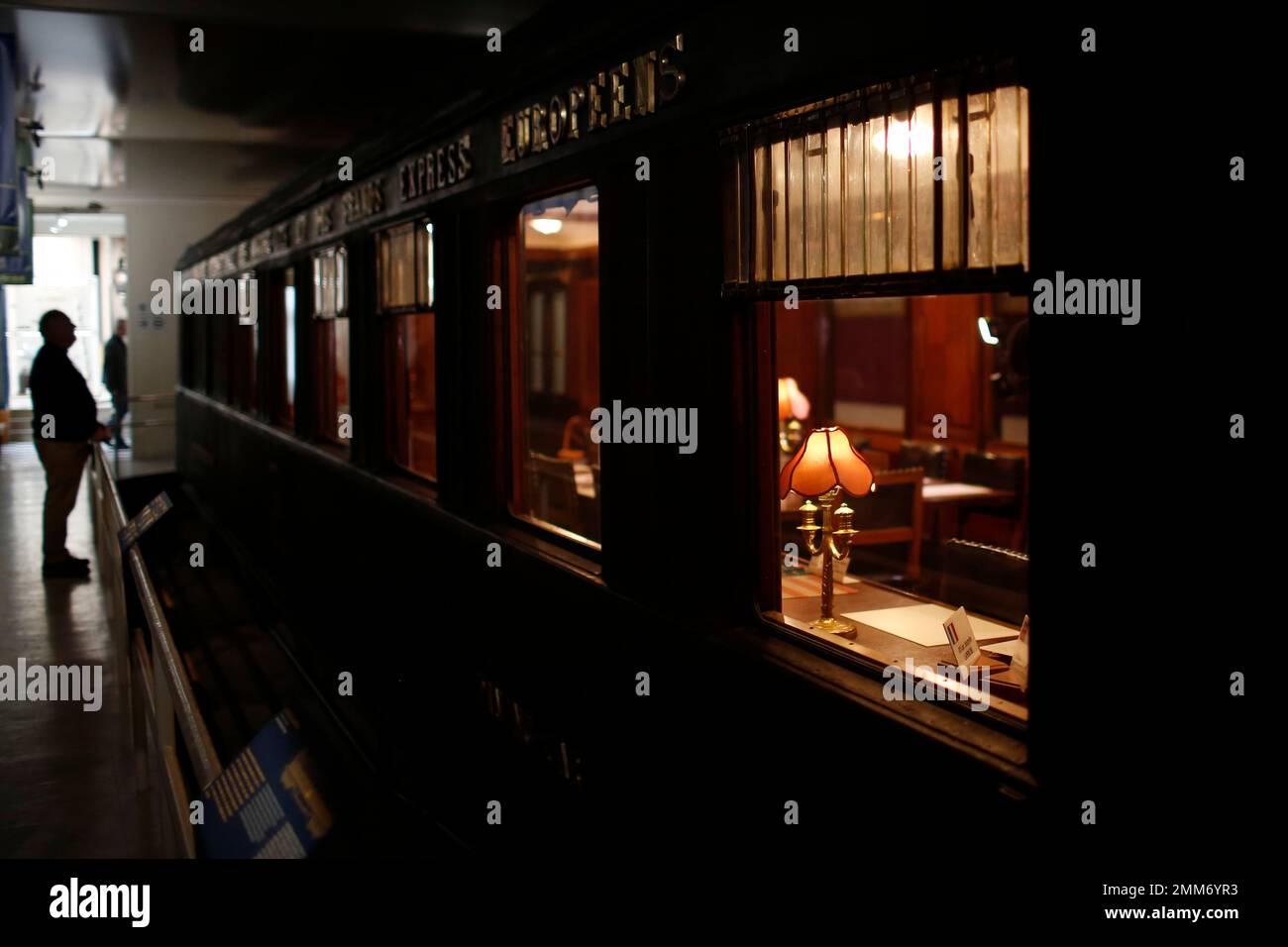 In this Oct. 19, 2018 photo, a visitor stands by the train carriage in ...