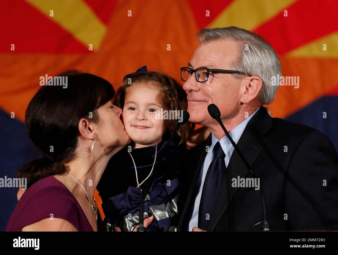 U.S. Rep. David Schweikert, R-Ariz., smiles as his wife, Joyce, kisses ...