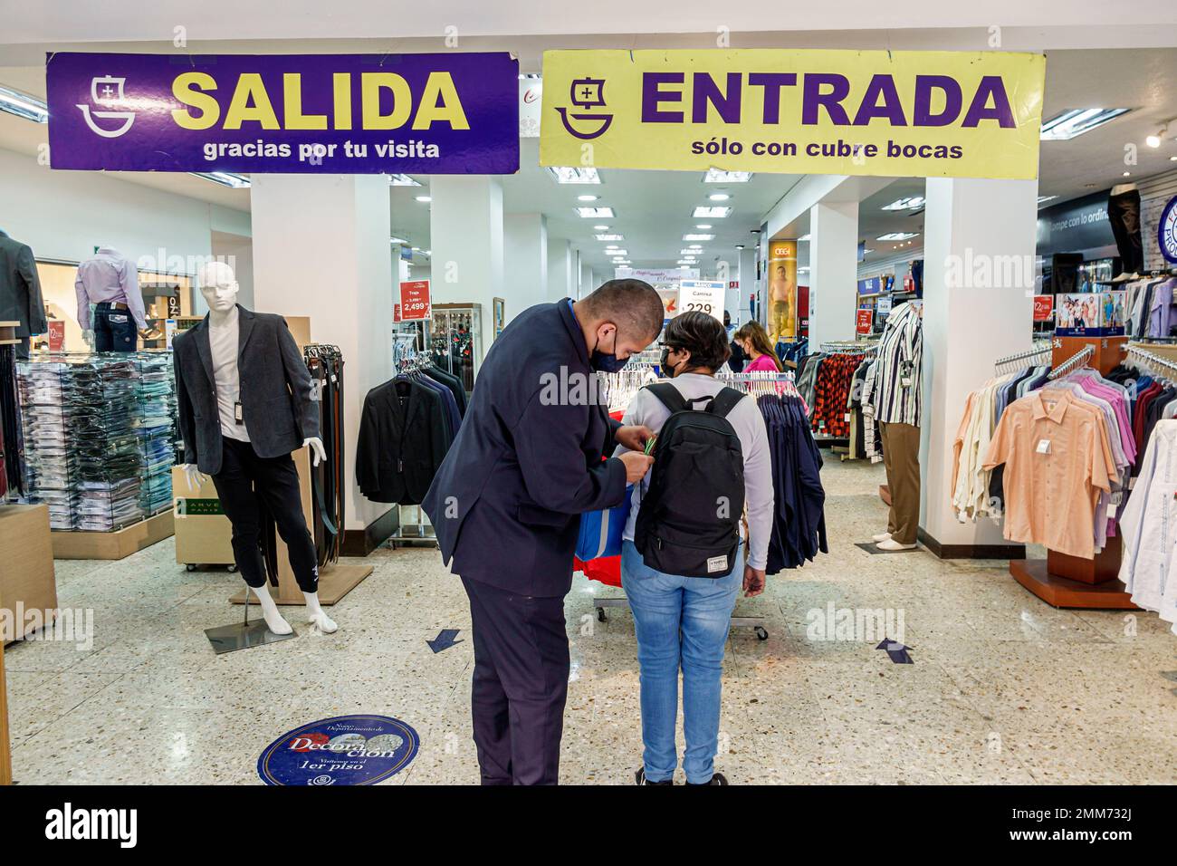 Female security guard shopping centre hi-res stock photography and ...
