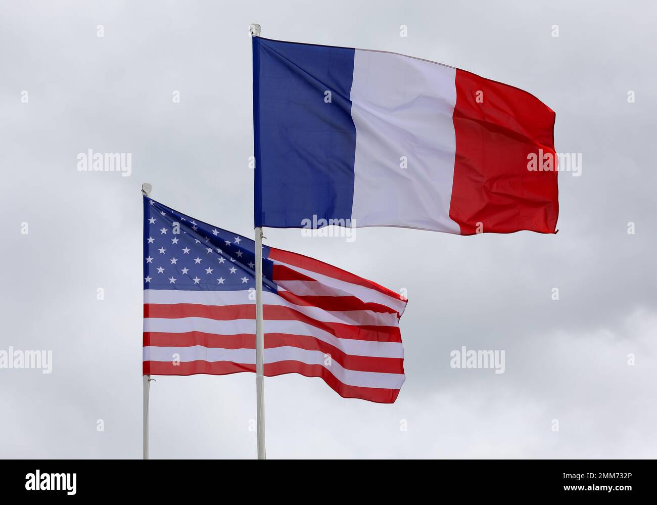 American and French flags flying together sign of international ...
