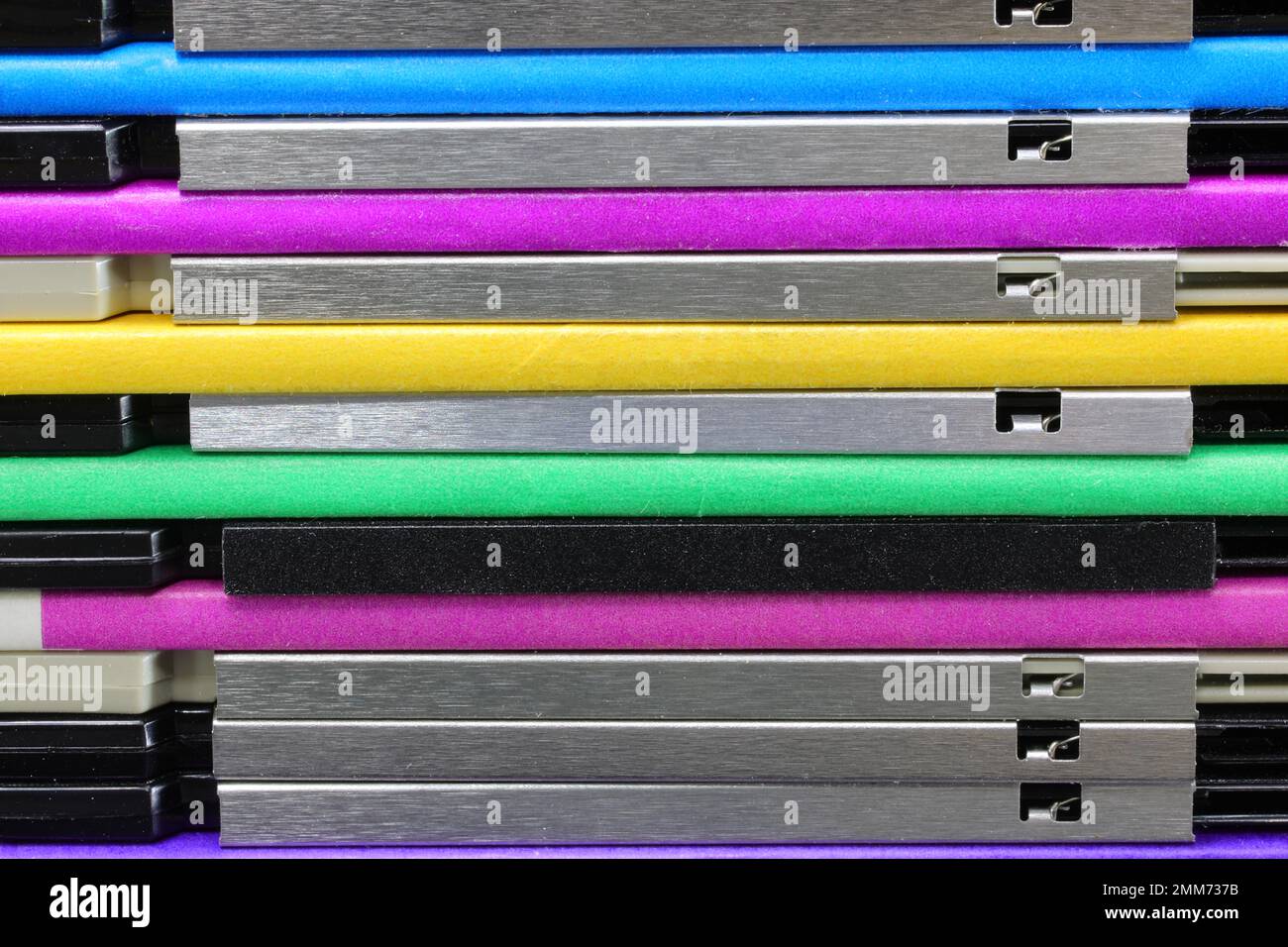 background of floppy disks used to save data from early personal ...