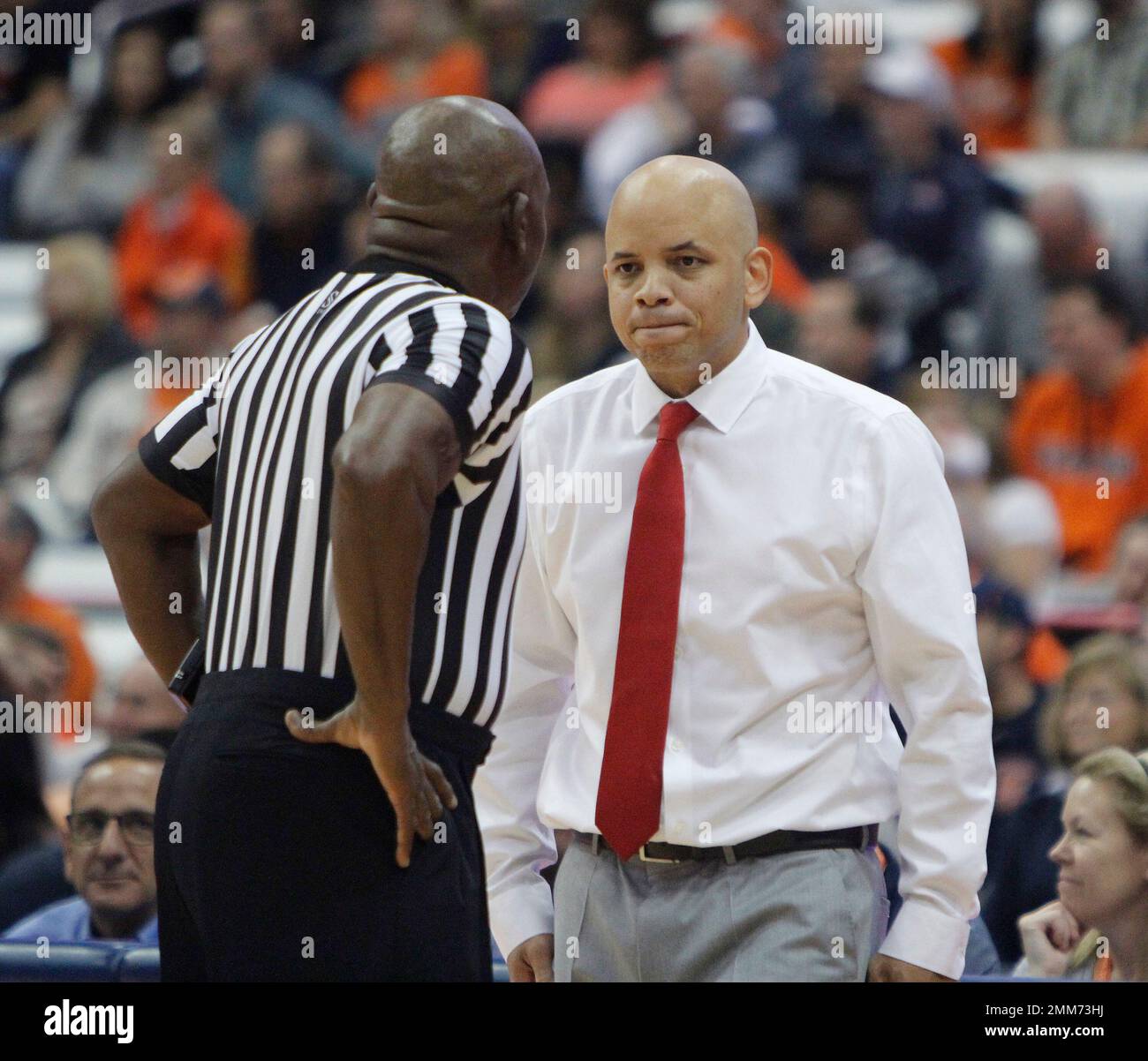 Eastern Washington head coach Shantay Legans talks with an official ...