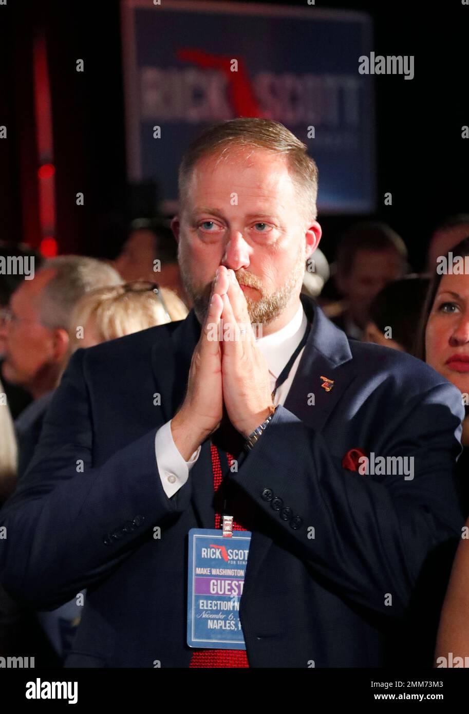 Danny Nix watches televised election results at an election watch party ...