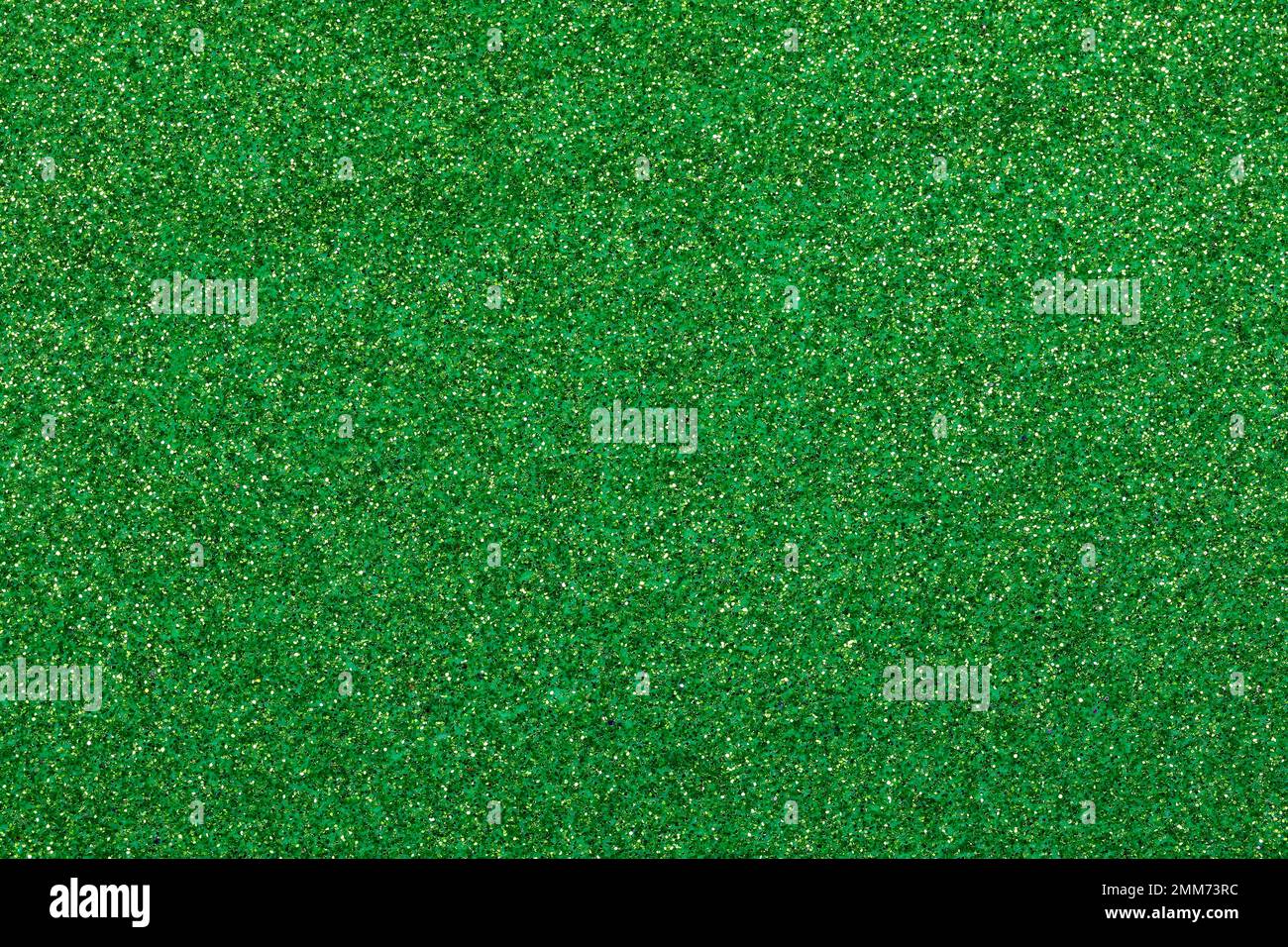 wide shimmering GREEN glitter material background with sparkles ideal ...