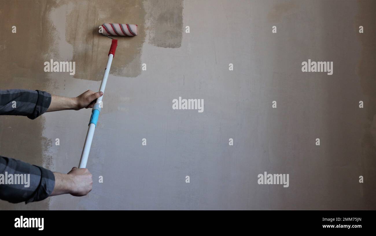 Priming the wall hi-res stock photography and images - Alamy