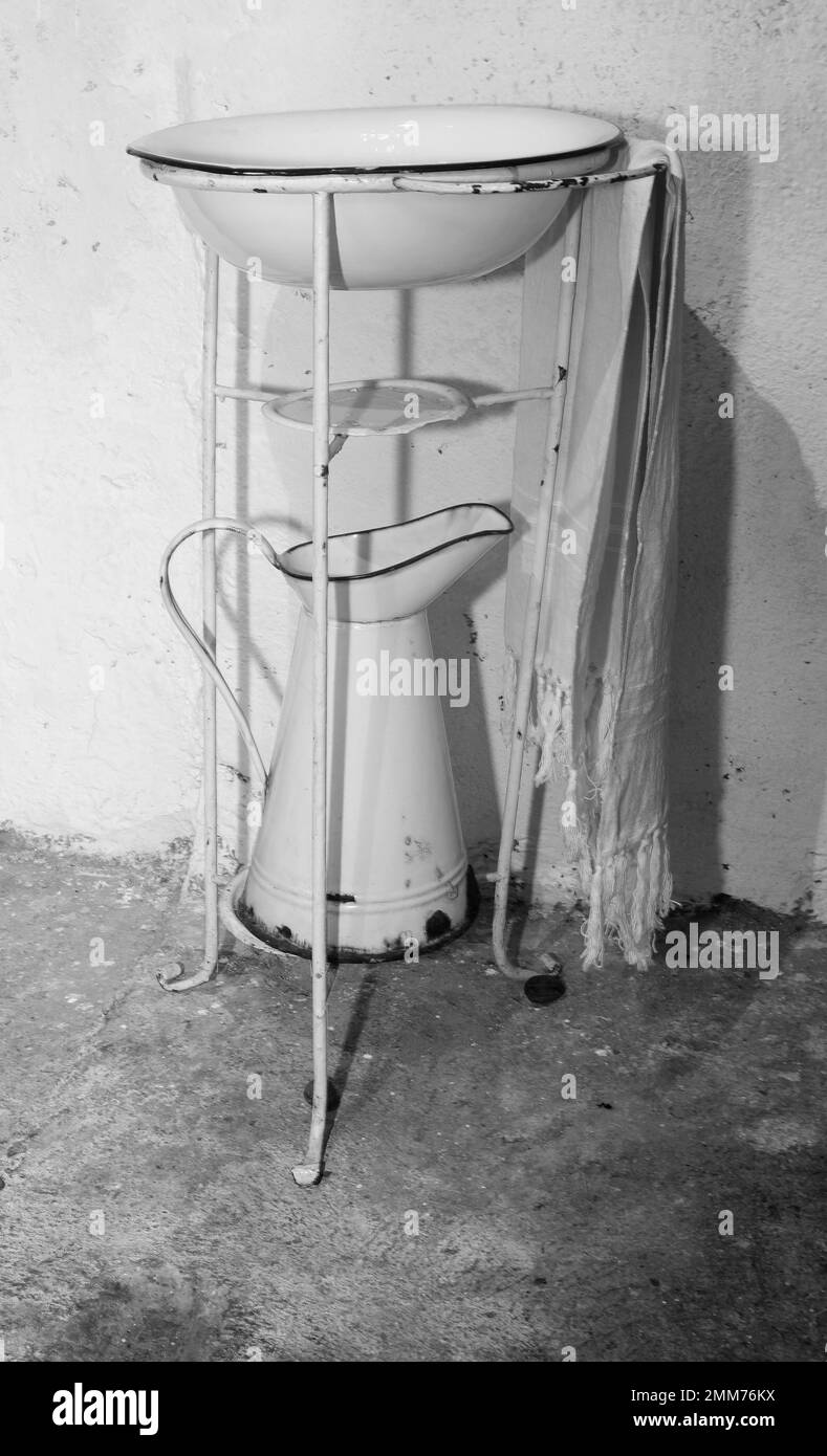 ancient set for cleaning the person with jug and ancient basin in the ...