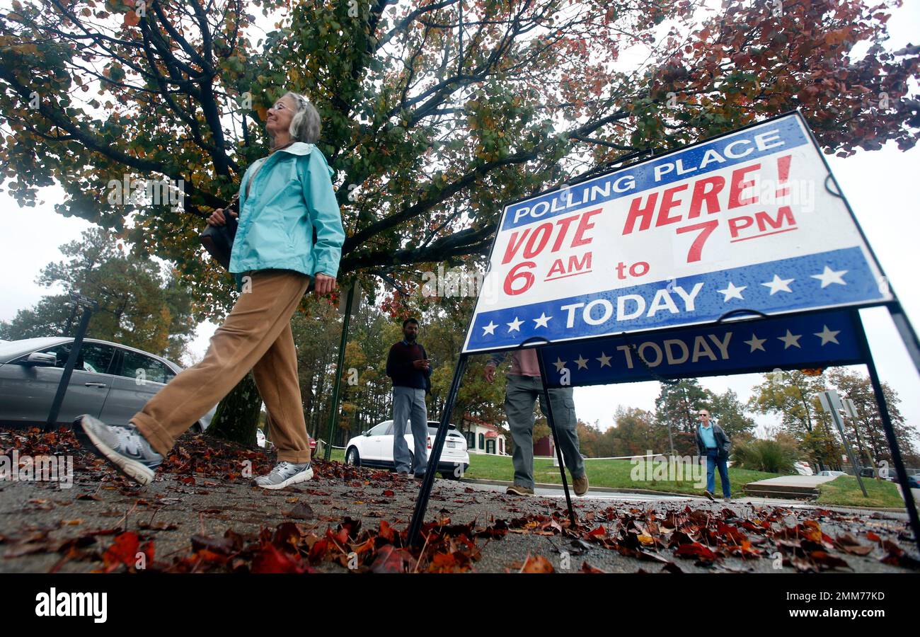 Voters enter a polling station in Short Pump, Va., Tuesday, Nov. 6 ...