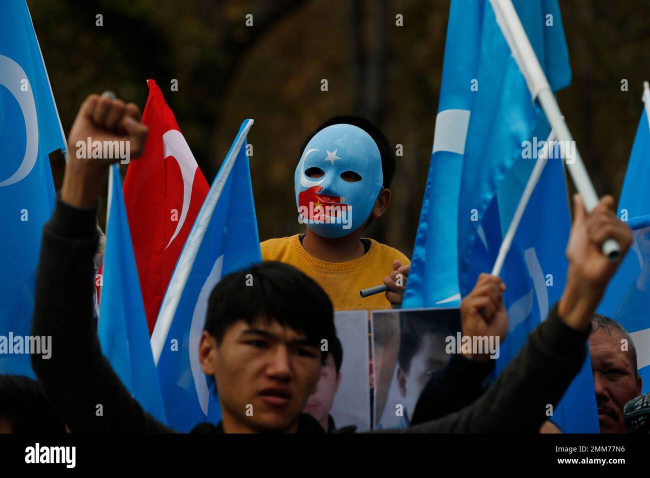 A child from the Uighur community living in Turkey wearing a mask in ...