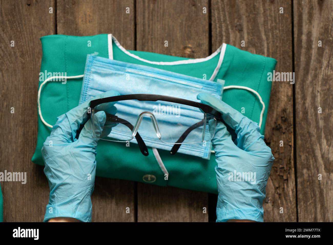 medical uniform set folded on an isolated background nurse Stock Photo ...