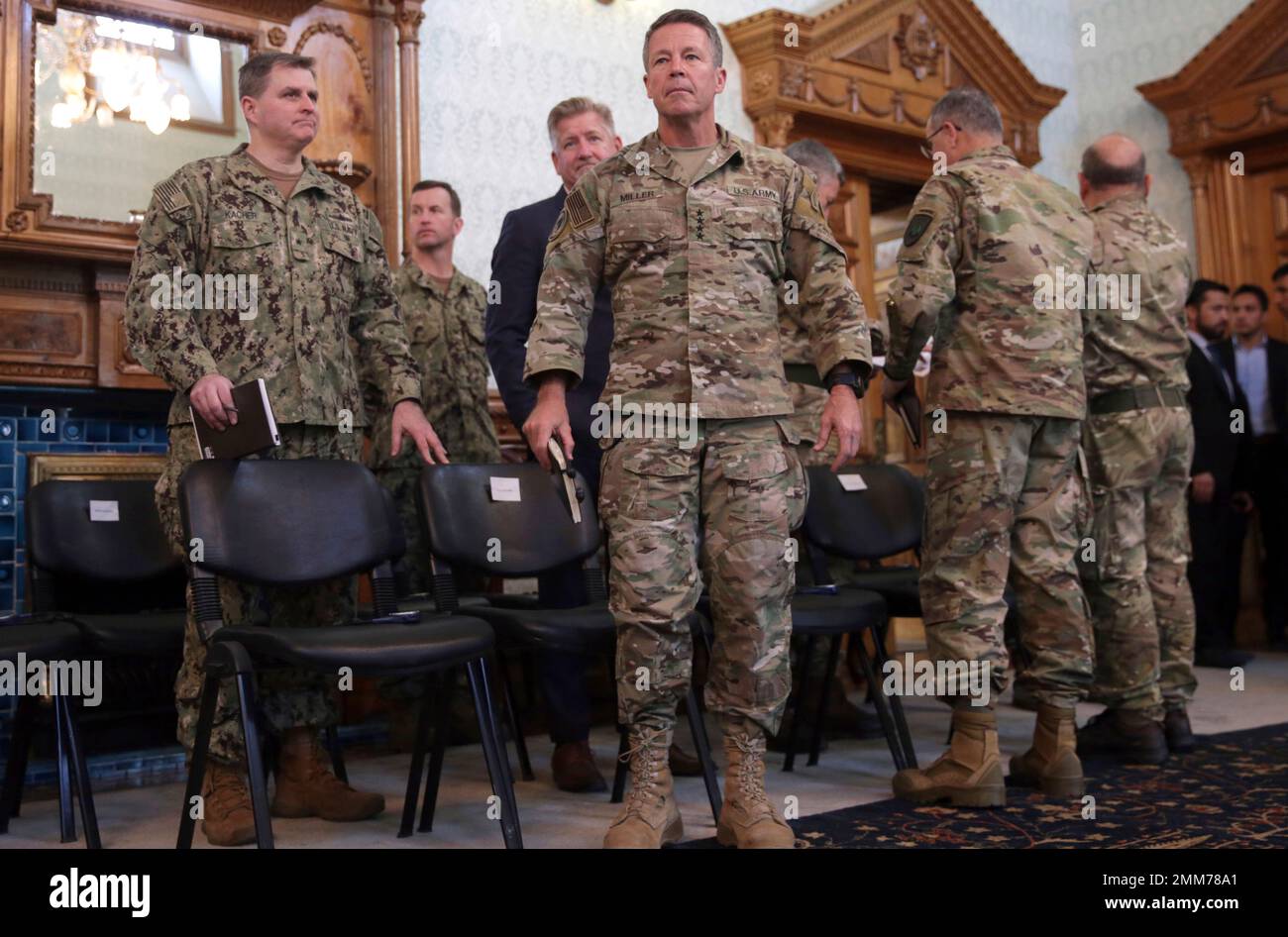 U.S. Army Gen. Scott Miller, center, commander of U.S. and NATO troops ...